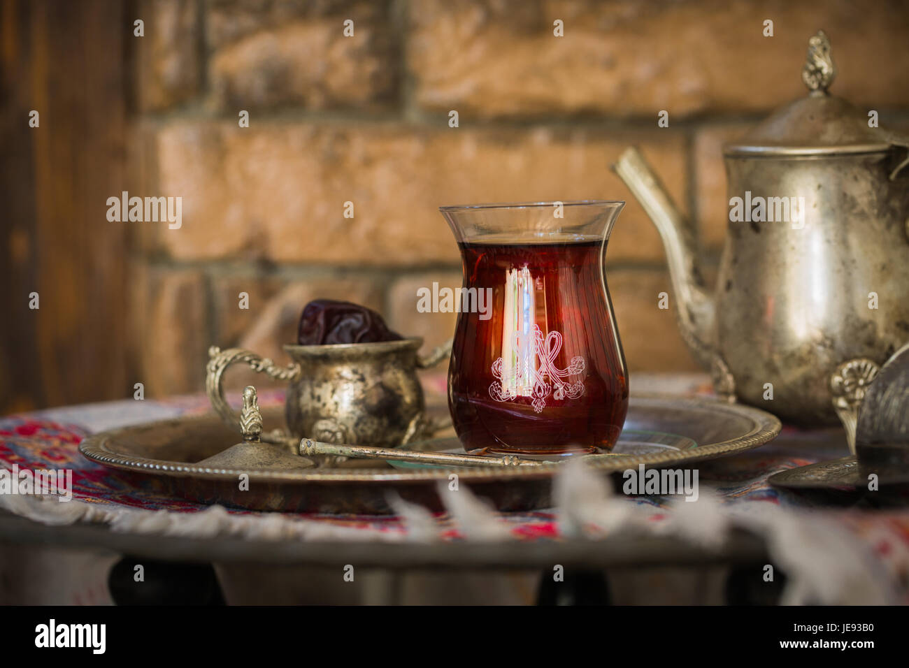 Tea set in oriental style in pear shaped glass with spoon and vintage ...
