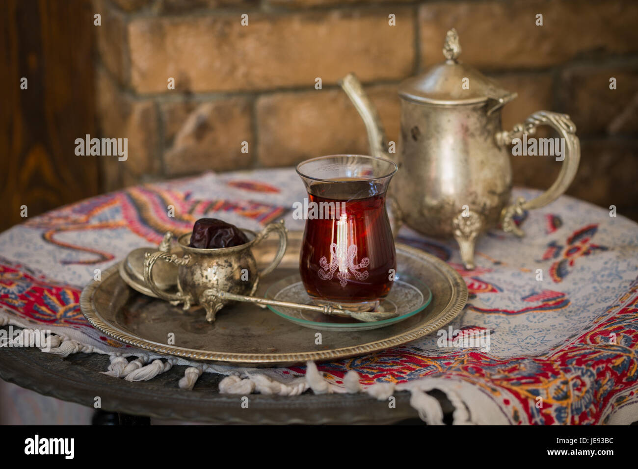 Tea set in oriental style in pear shaped glass with spoon and vintage ...