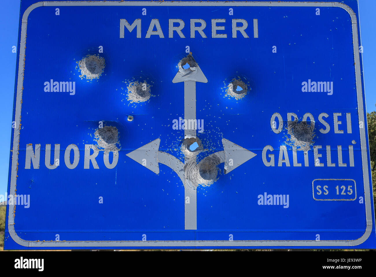 Road sign with bullet holes Stock Photo - Alamy
