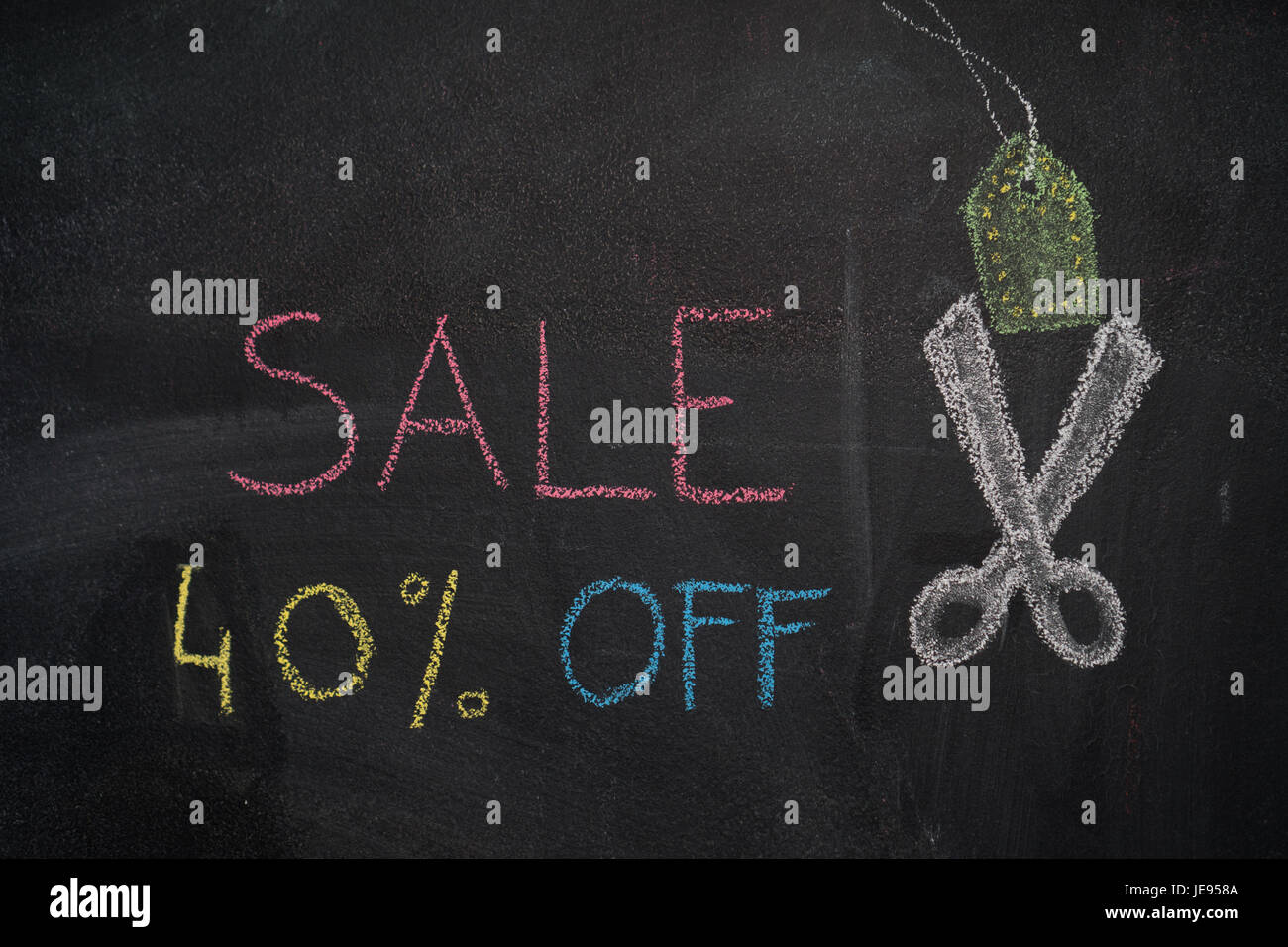 Sale 40% off. Sale and discount price sign with scissors cutting price ...