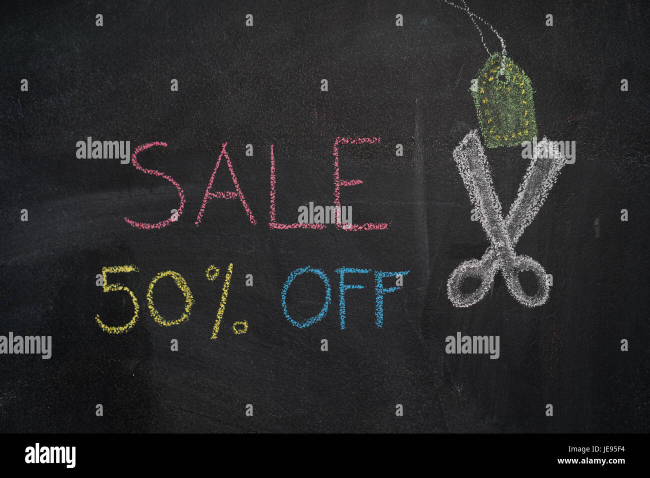 Sale 50% off. Sale and discount price sign with scissors cutting price ...