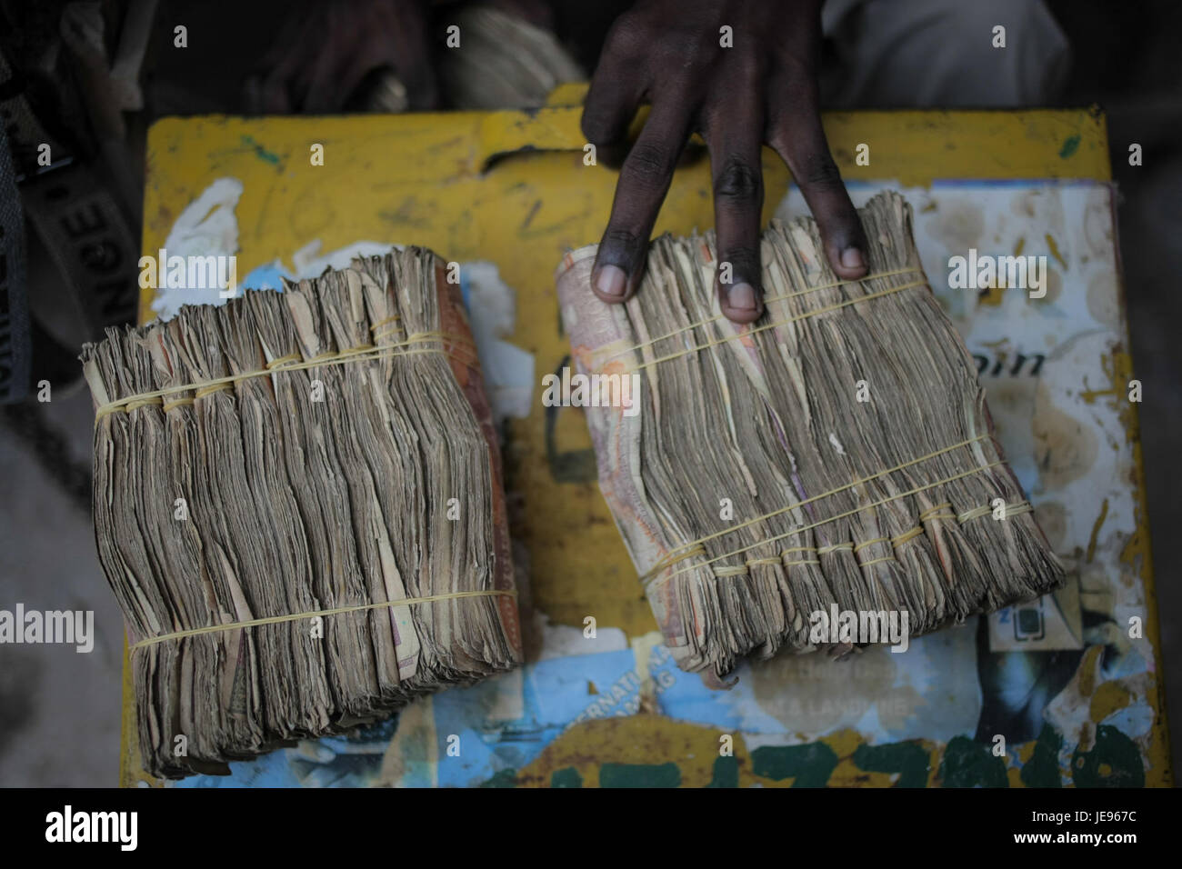 This image features a Barclays Money Transfer service advertisement ...