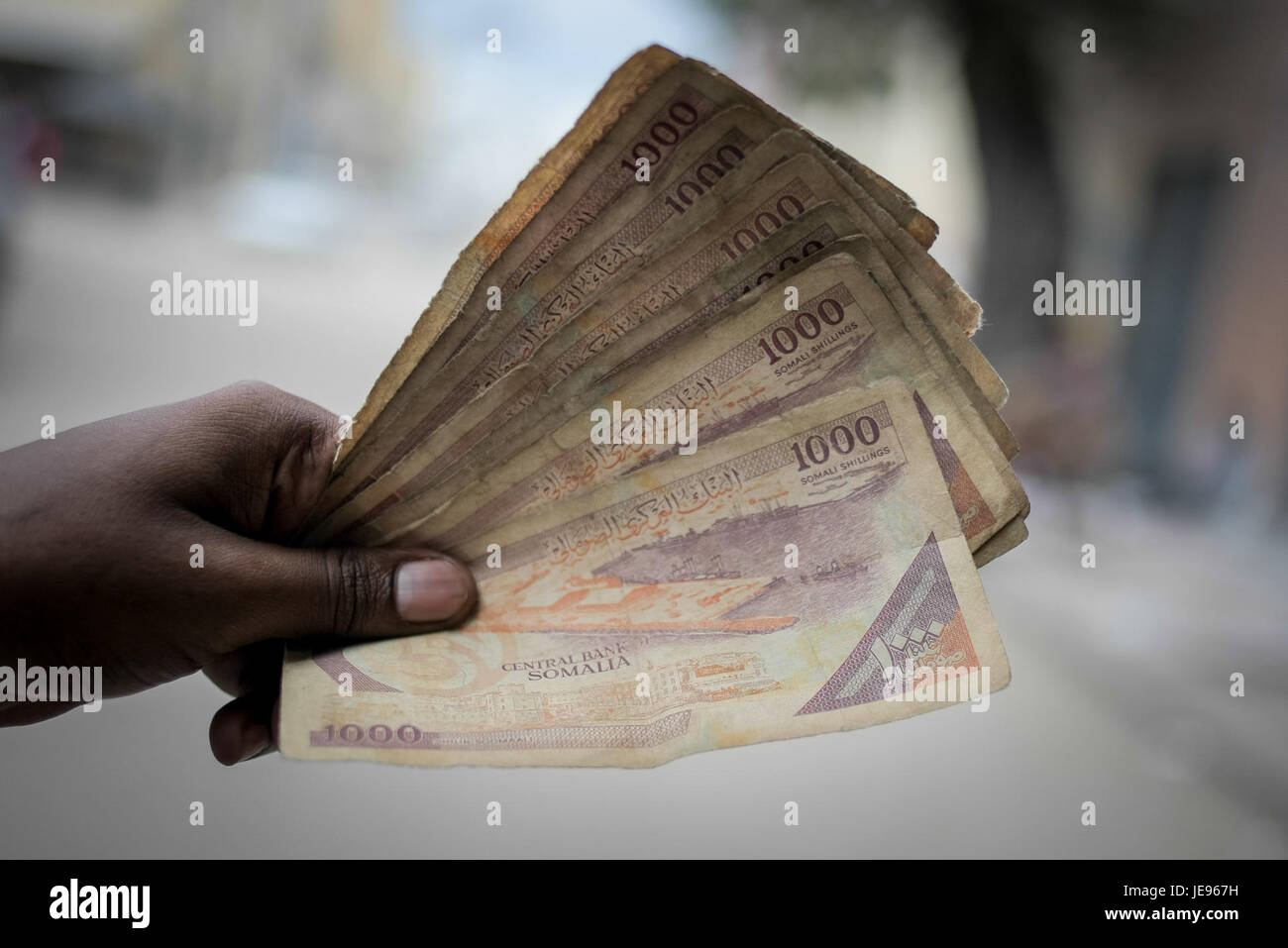 A photograph depicting a remittance transfer transaction facilitated by ...