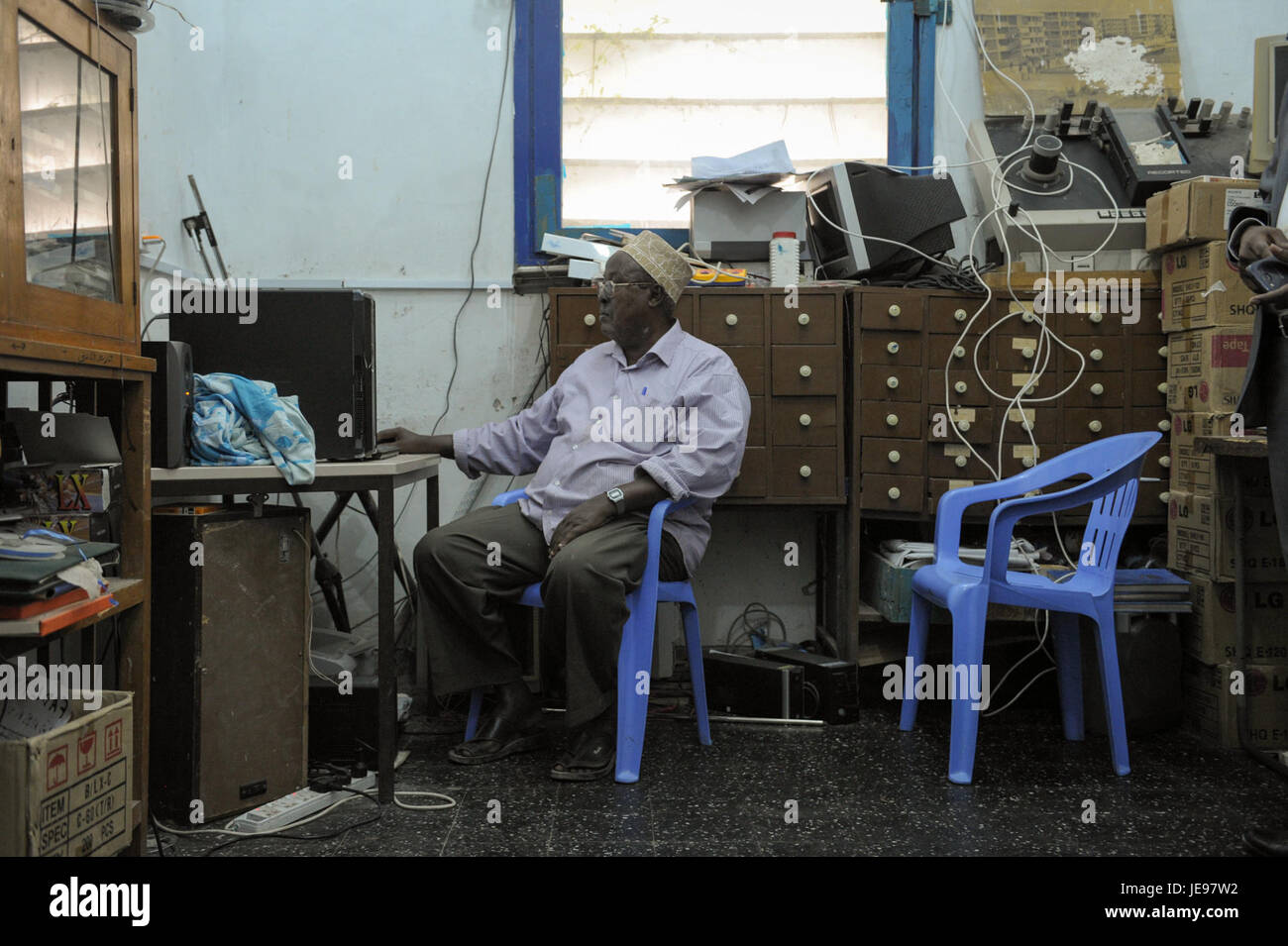 This image shows a broadcast session at Radio Mogadishu, a prominent ...