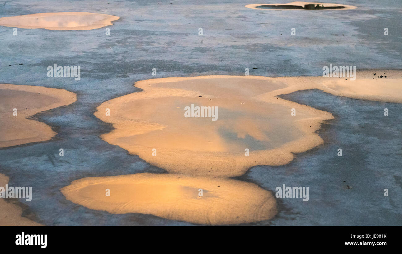Wet road sun puddle hi-res stock photography and images - Alamy