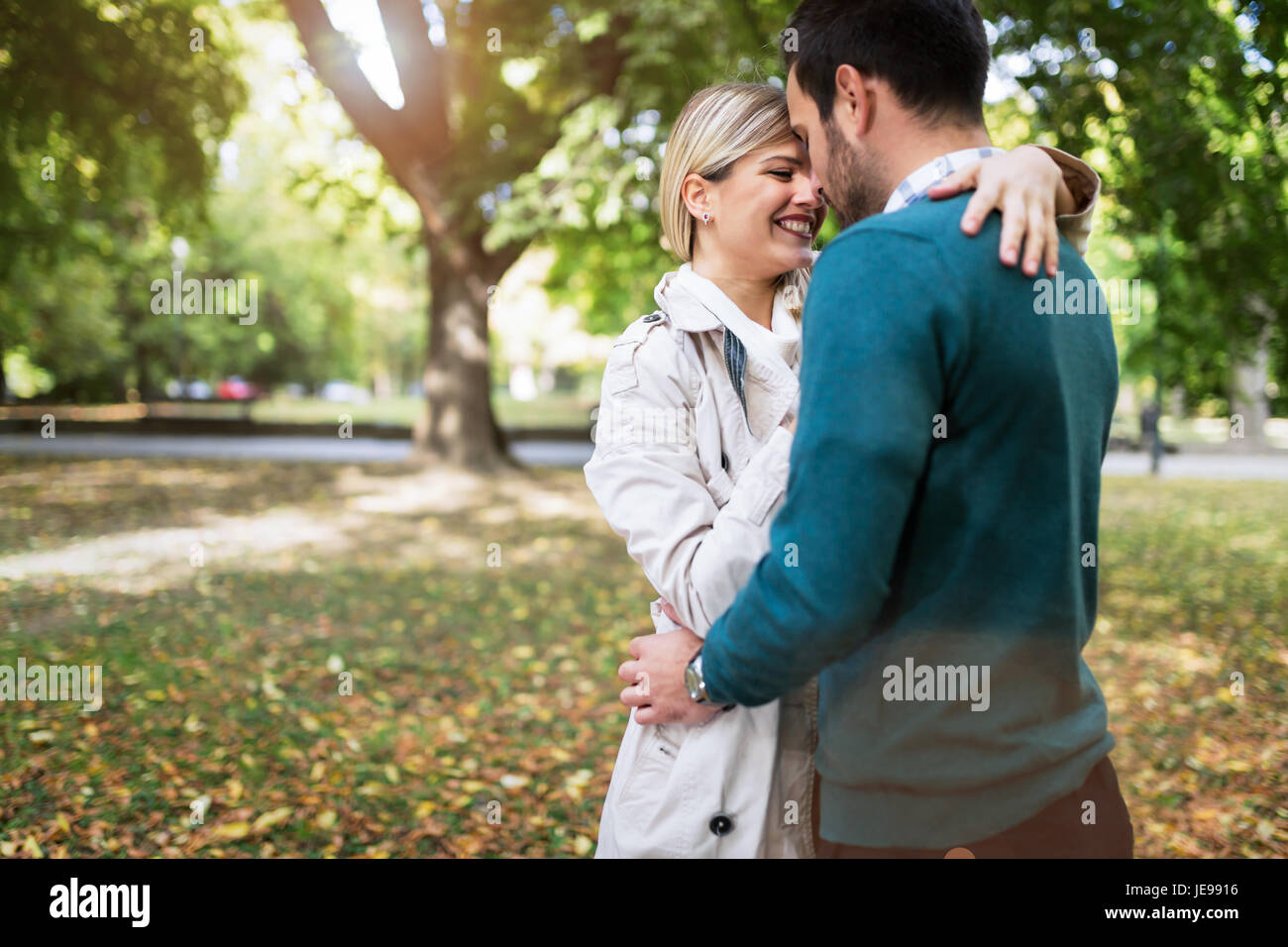Young happy couple in love spending time together Stock Photo - Alamy