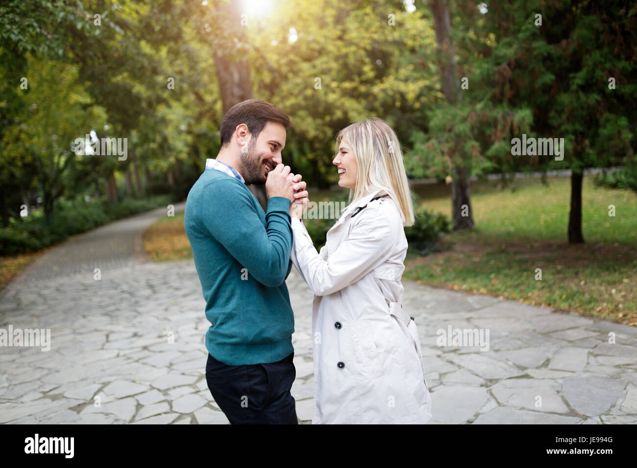 Young happy couple in love spending time together Stock Photo - Alamy