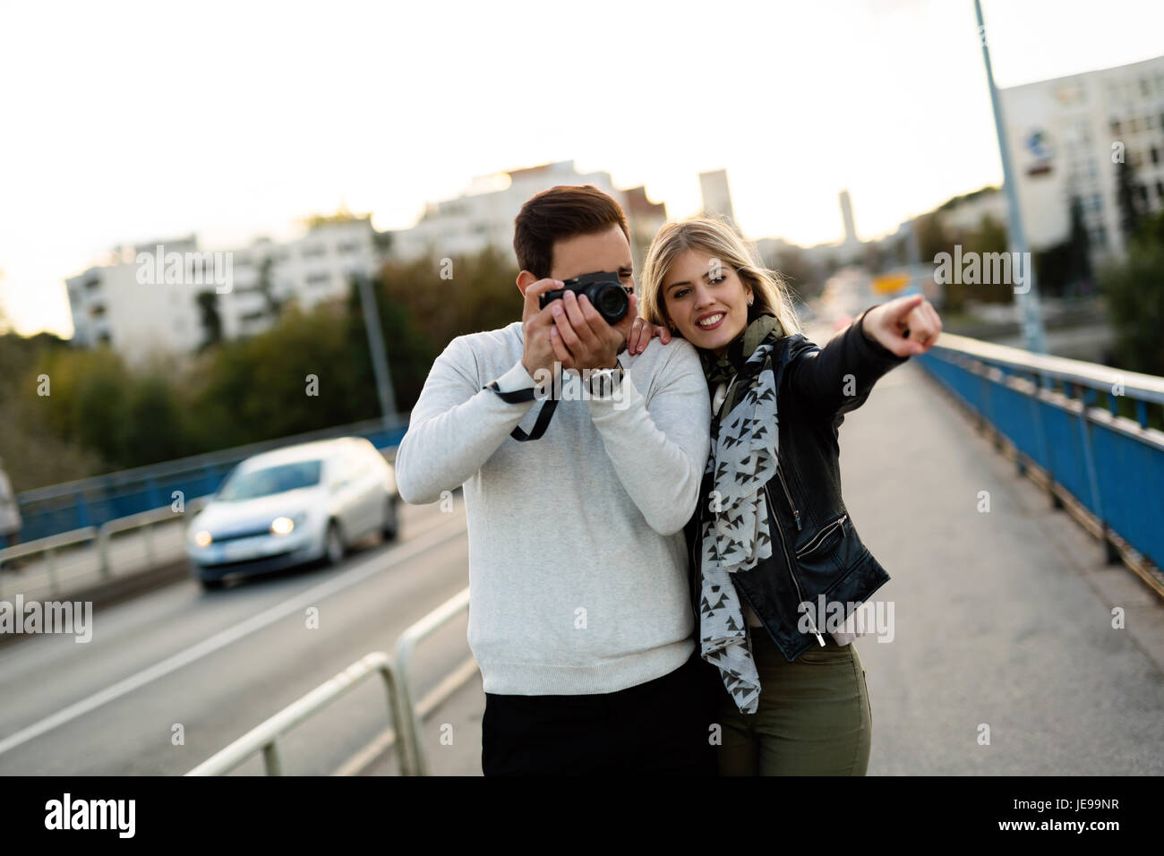 Happy couple in love traveling and bonding Stock Photo - Alamy