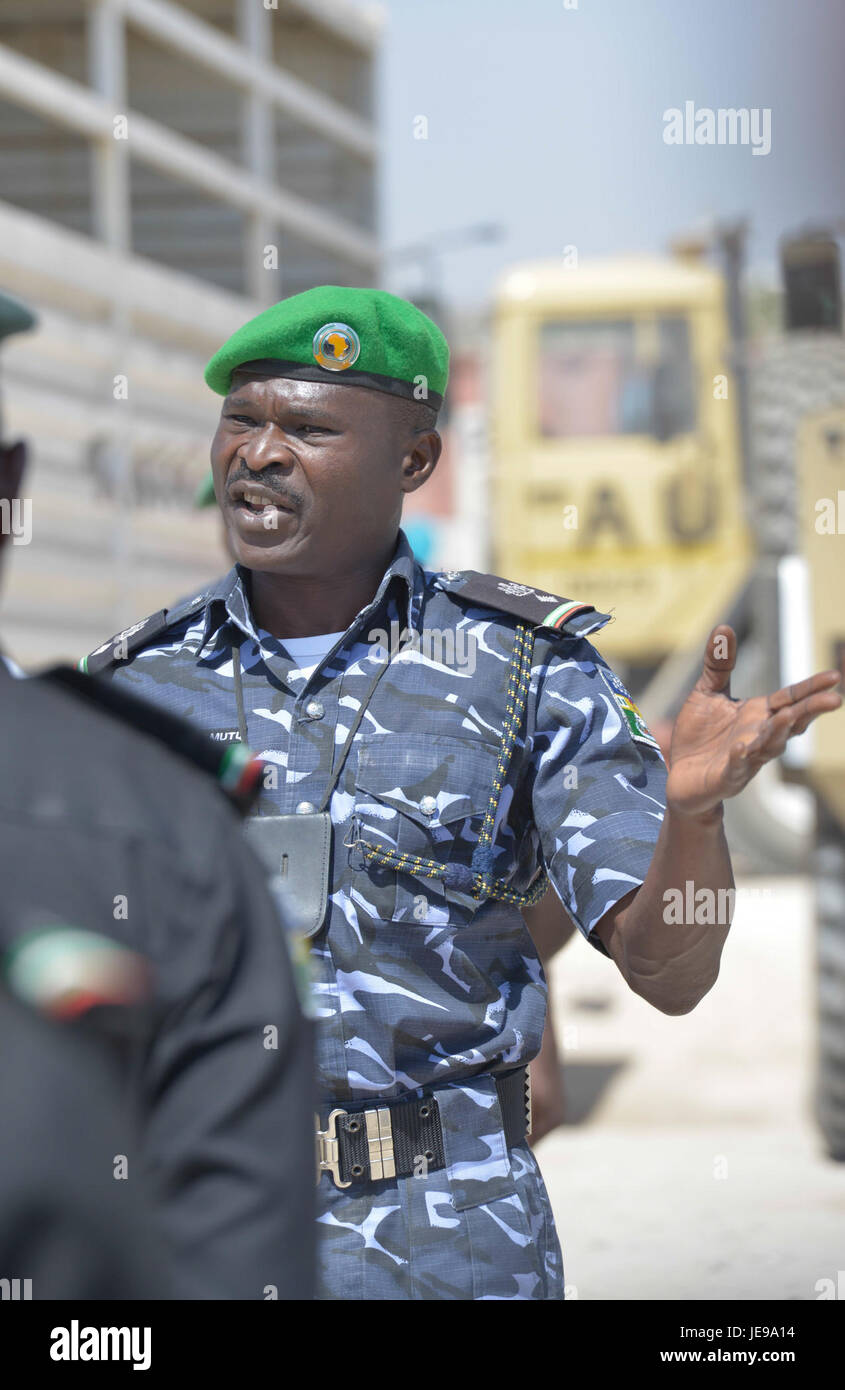 The image depicts a Nigerian police unit during its replacement and ...