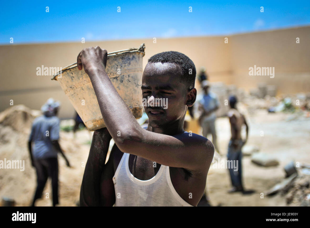 A photograph from the opening ceremony of a school construction project ...