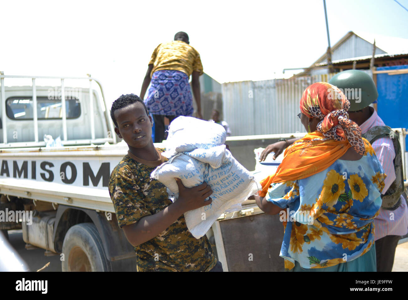 This image captures a food donation event held in April 2014, where ...