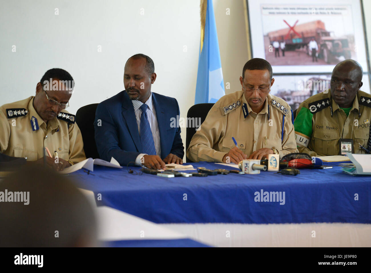This image shows the Somali Police Commissioner during a public event ...