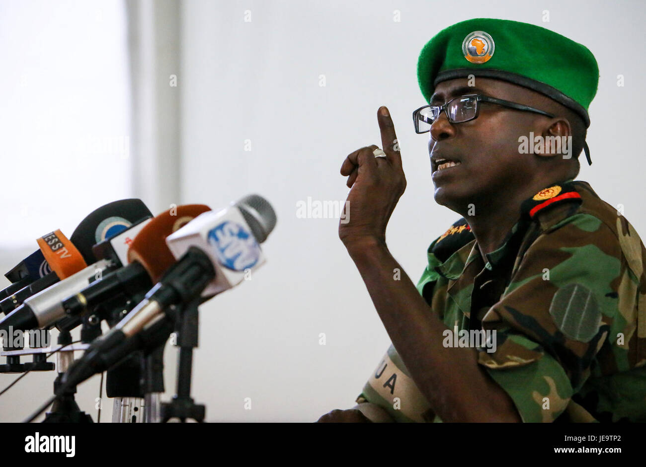 This image shows the spokesperson for the African Union Mission in ...