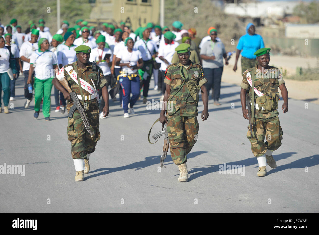This image shows a group of female peacekeepers from AMISOM walking ...