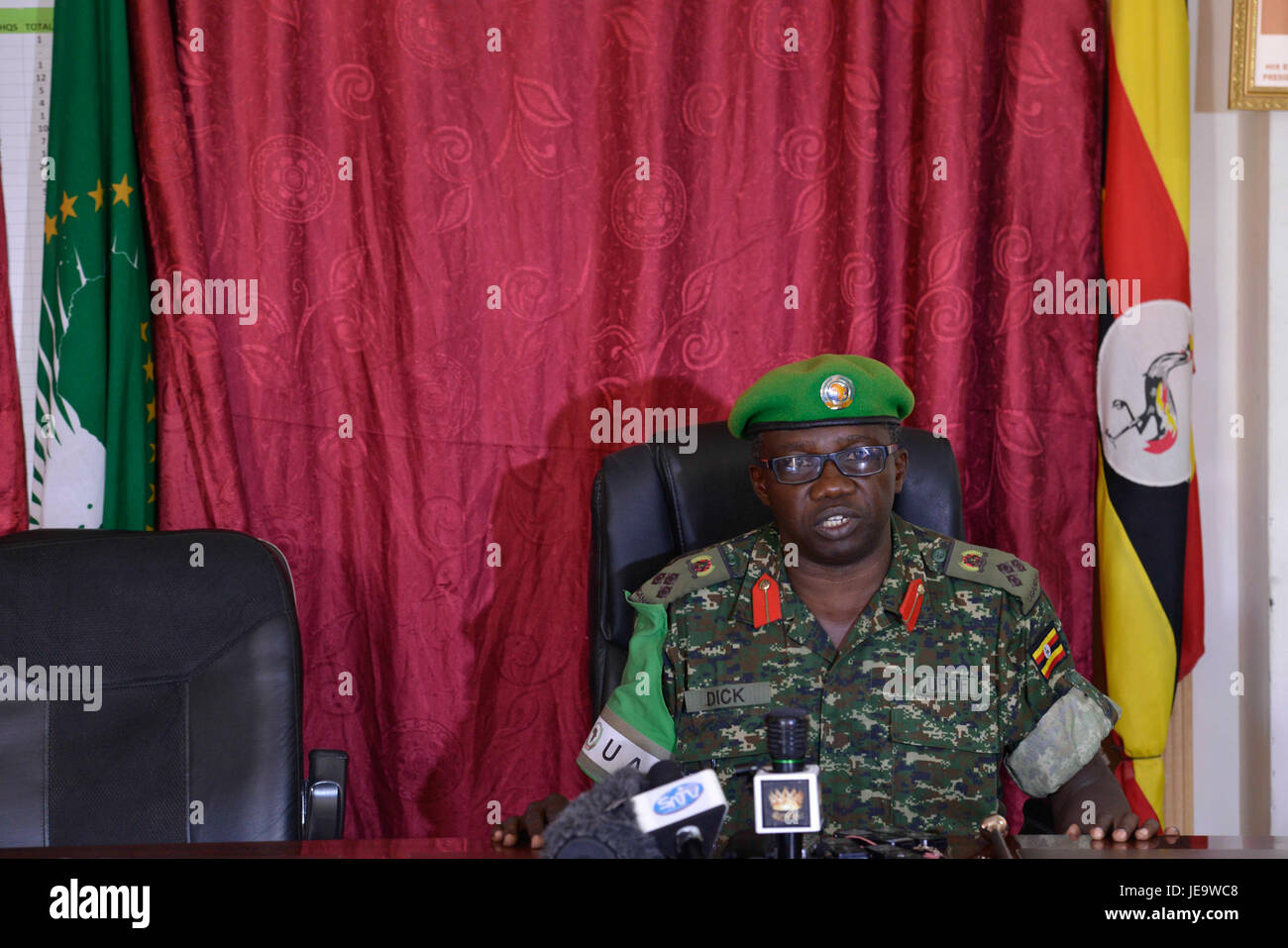 The image depicts the handover of captives by AMISOM (African Union ...