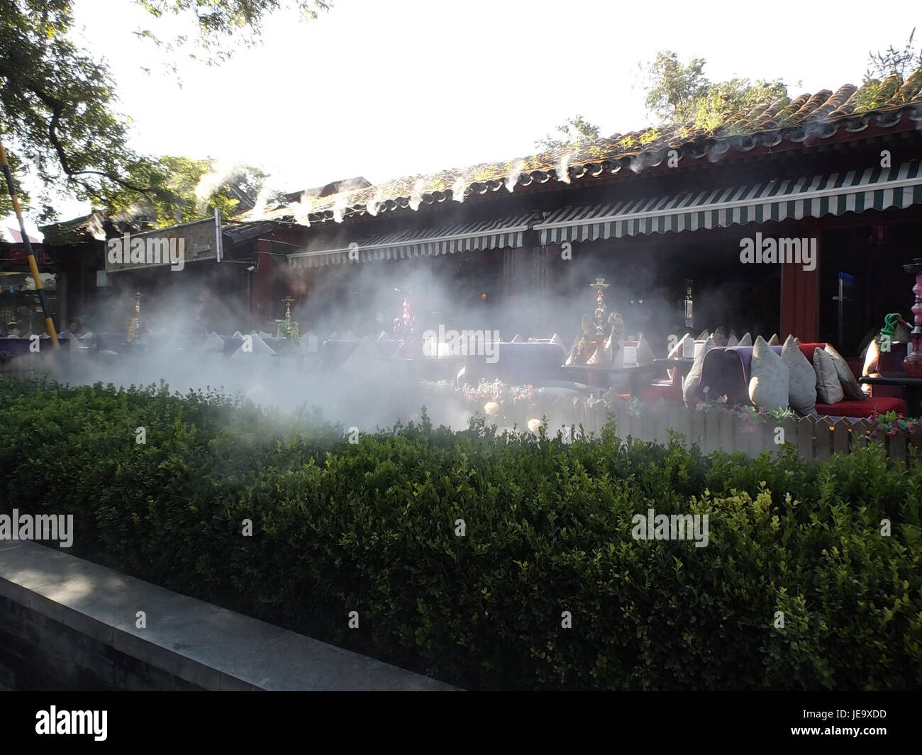 The image shows a bar spray installation in Qianhai, Beijing, captured ...