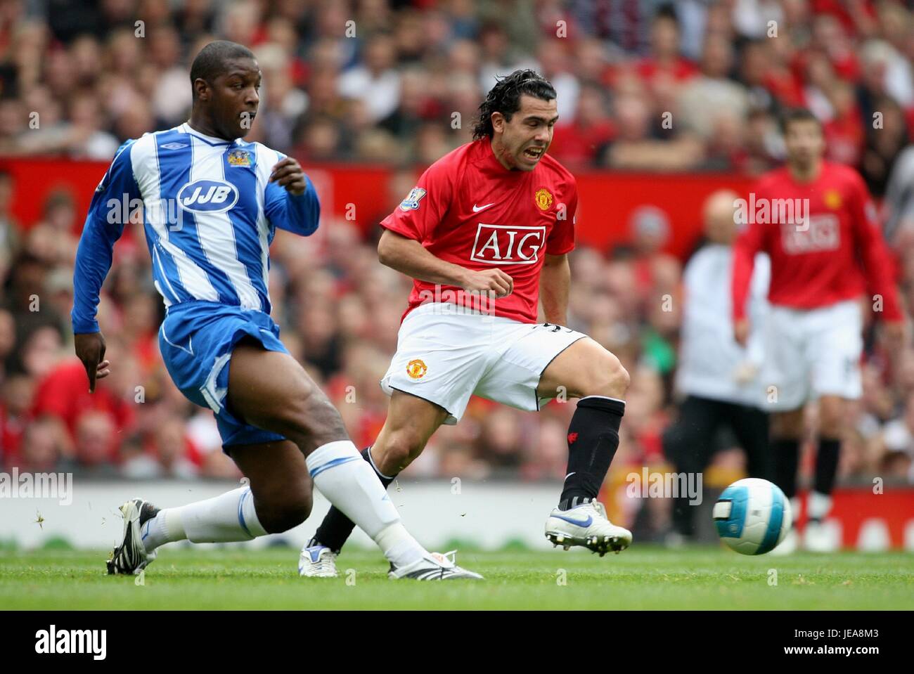 TITUS BRAMBLE & CARLOS TEVEZ MANCHESTER UNITED V WIGAN ATH OLD TRAFFORD ...