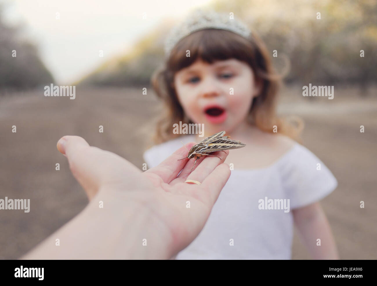 Girl with insect hi-res stock photography and images - Alamy