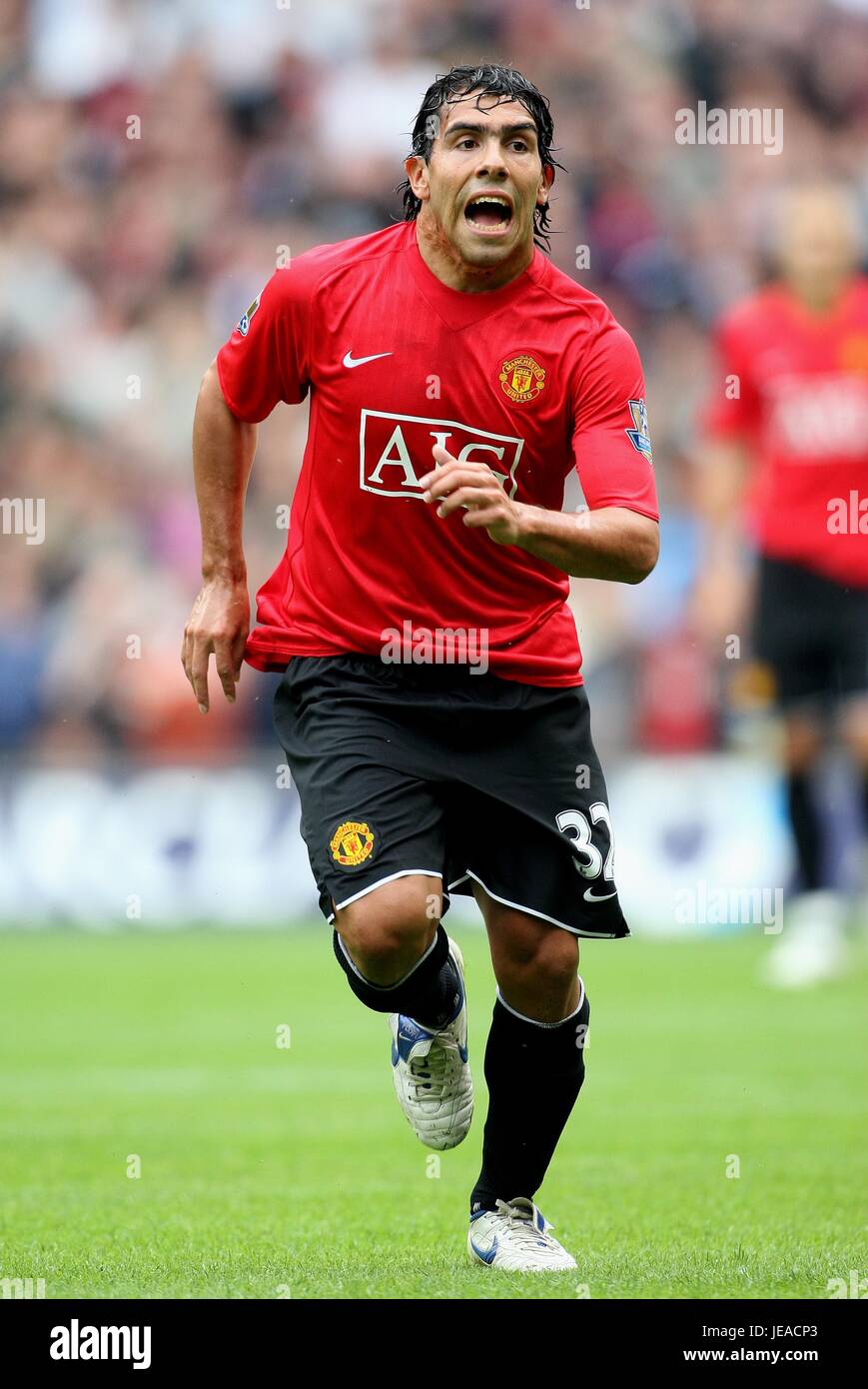 CARLOS TEVEZ MANCHESTER UNITED FC CITY OF MANCHESTER STADIUM MANCHESTER ...