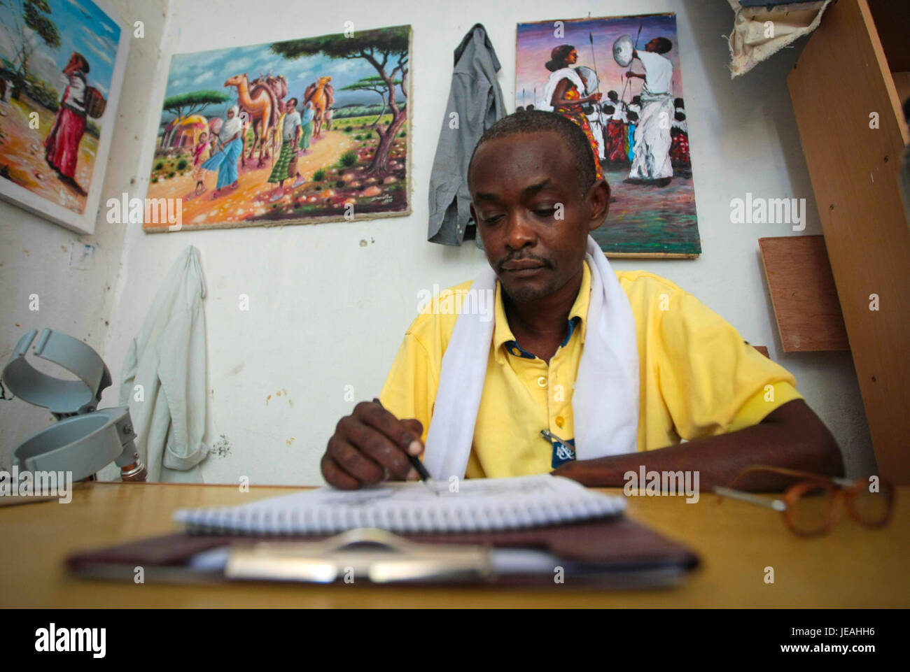 This image features Somali artists showcasing their works. Somali art is known for its ...