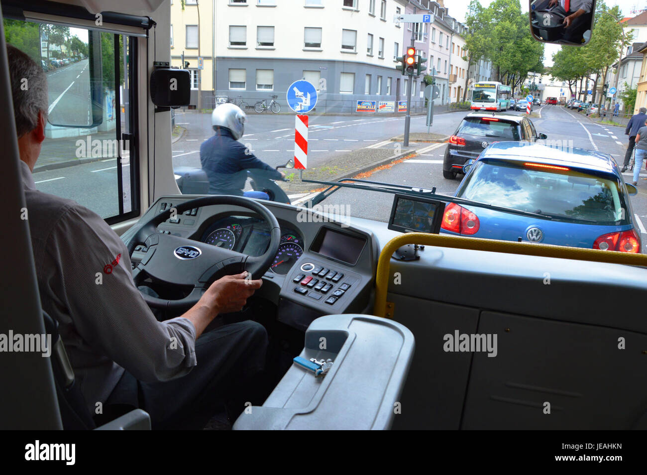 The image depicts the interior of a BYD electric bus in Bonn, Germany ...