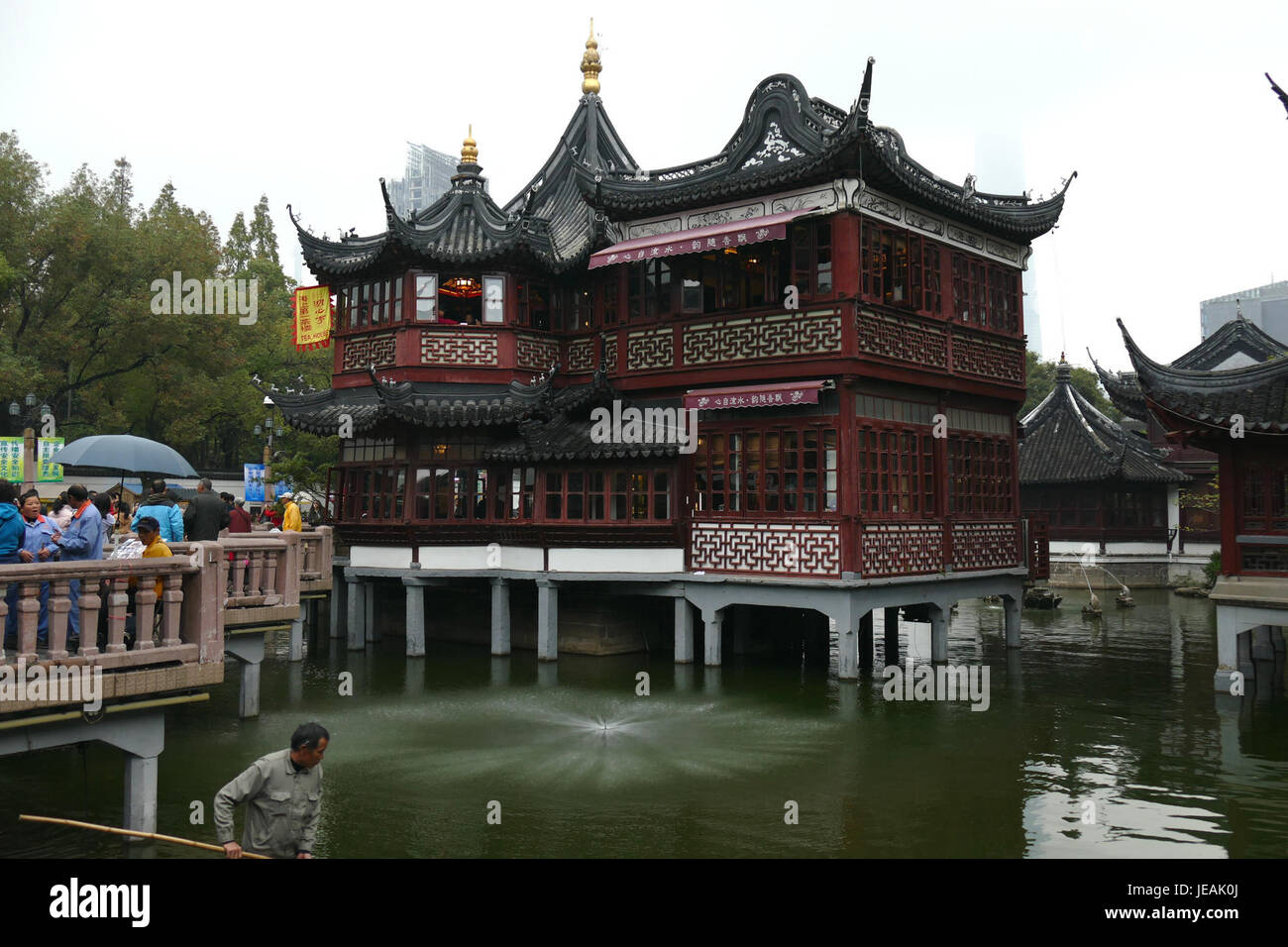 Jiuqu Bridge is located in Yuyuan Park in Shanghai, China. It is a ...