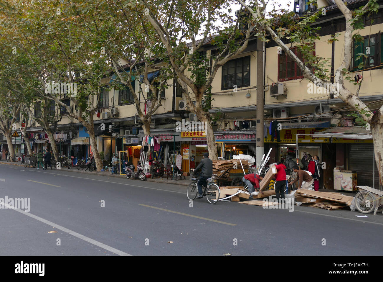 This photograph captures the bustling scene along Madang Road in ...