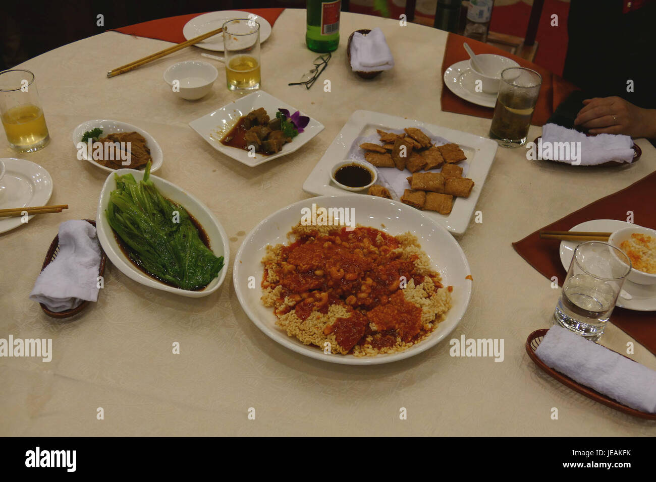 The photo shows a meal at Lou Wai Lou, a well-known restaurant in Xihu ...