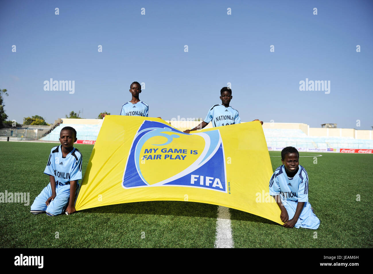 This image captures a moment from a Somali football match held on ...