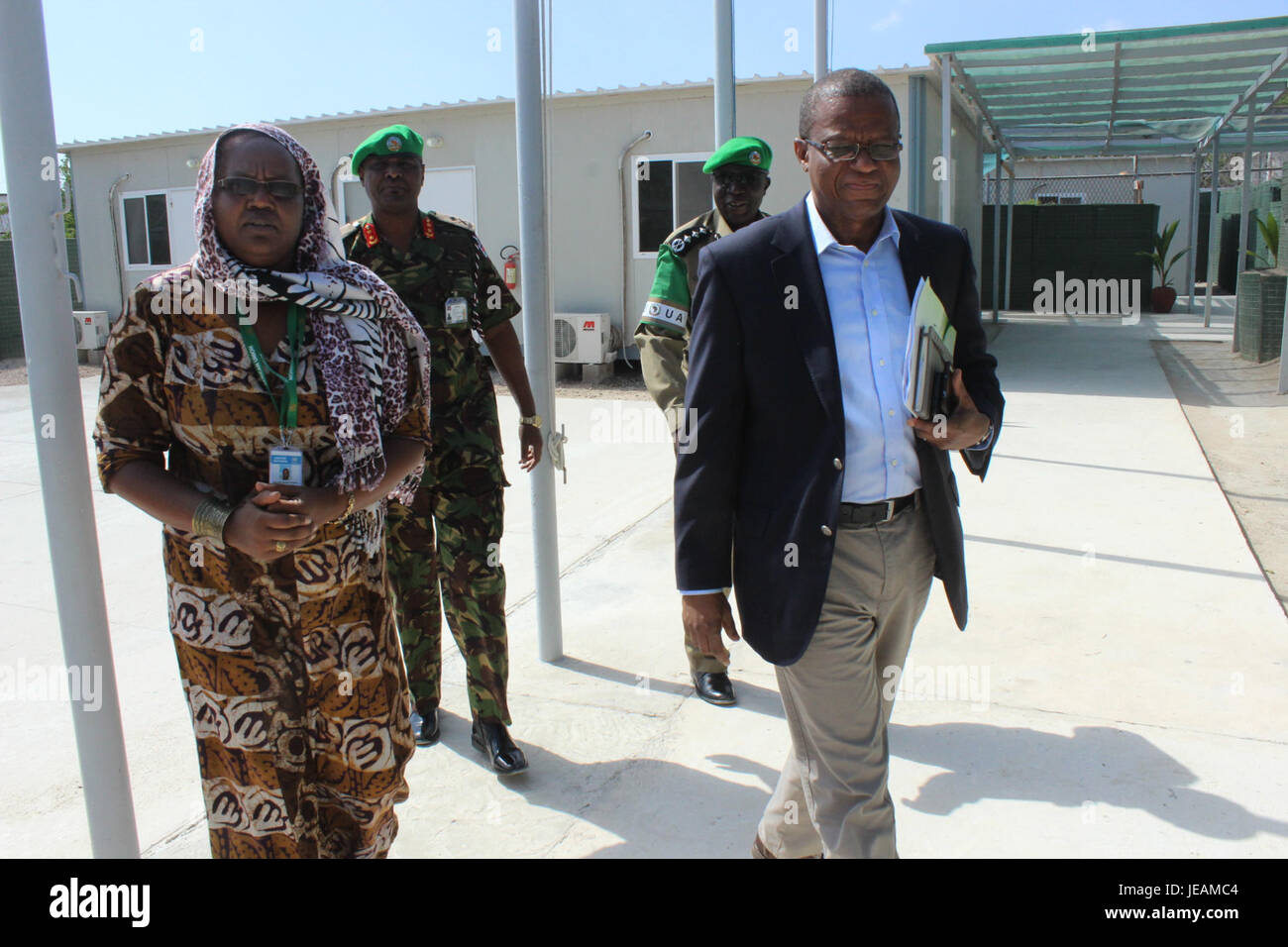 This image shows a press conference held by the African Union Mission ...