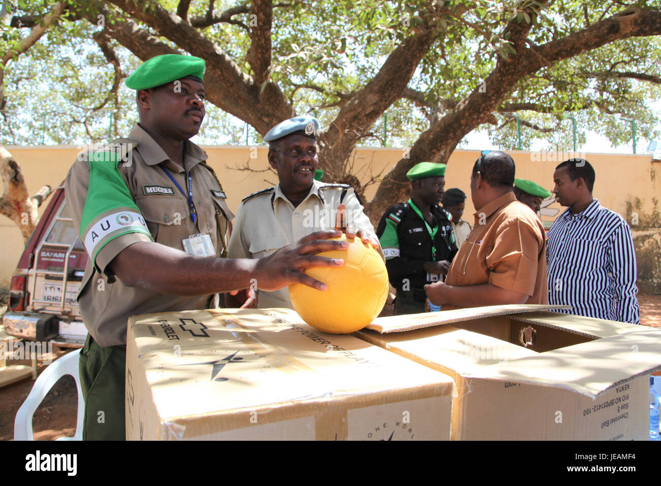 AMISOM police donated footballs to youth groups in Baidoa, Somalia, in ...