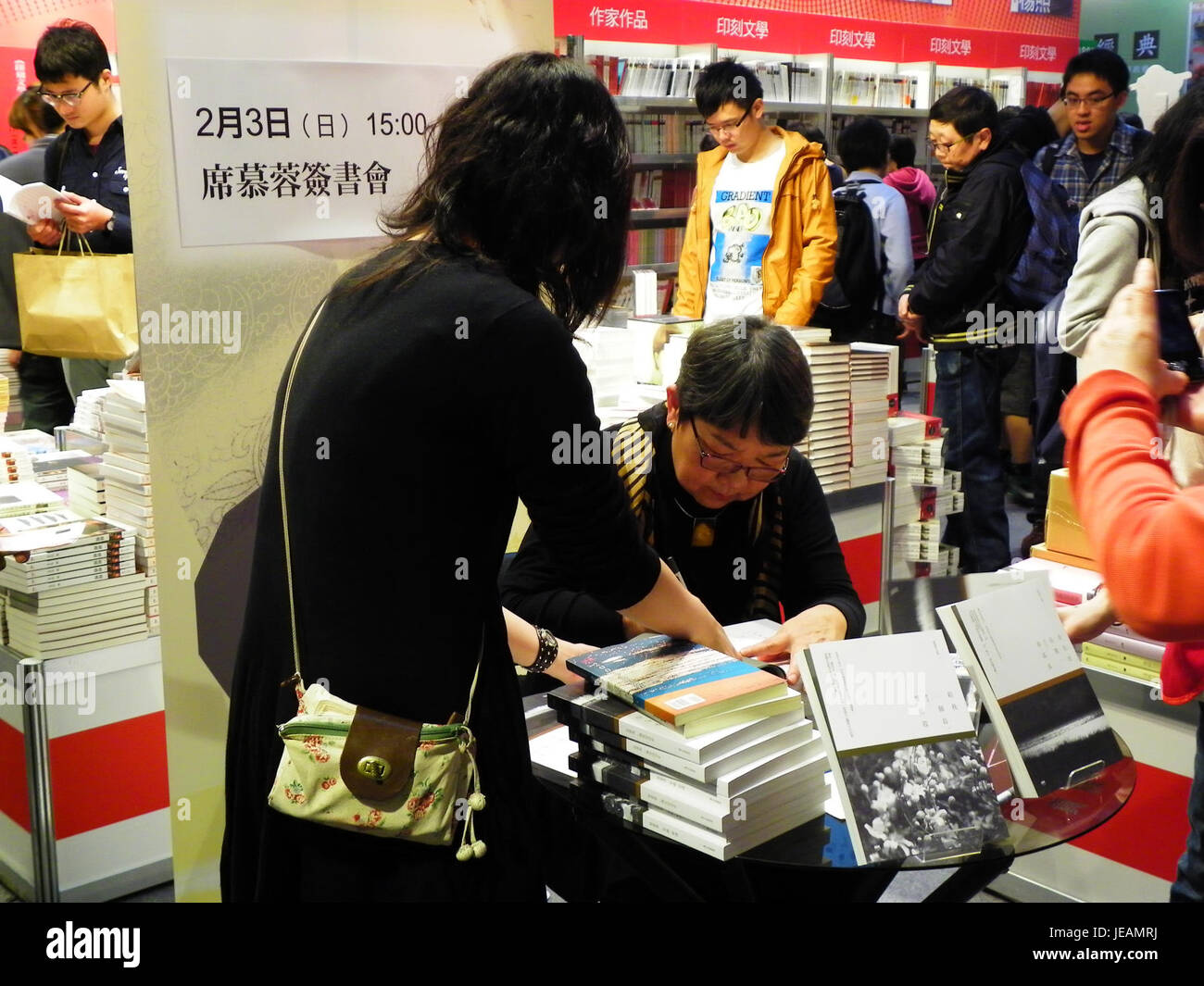 This photograph captures the book signing event of Xi Murong during Day ...