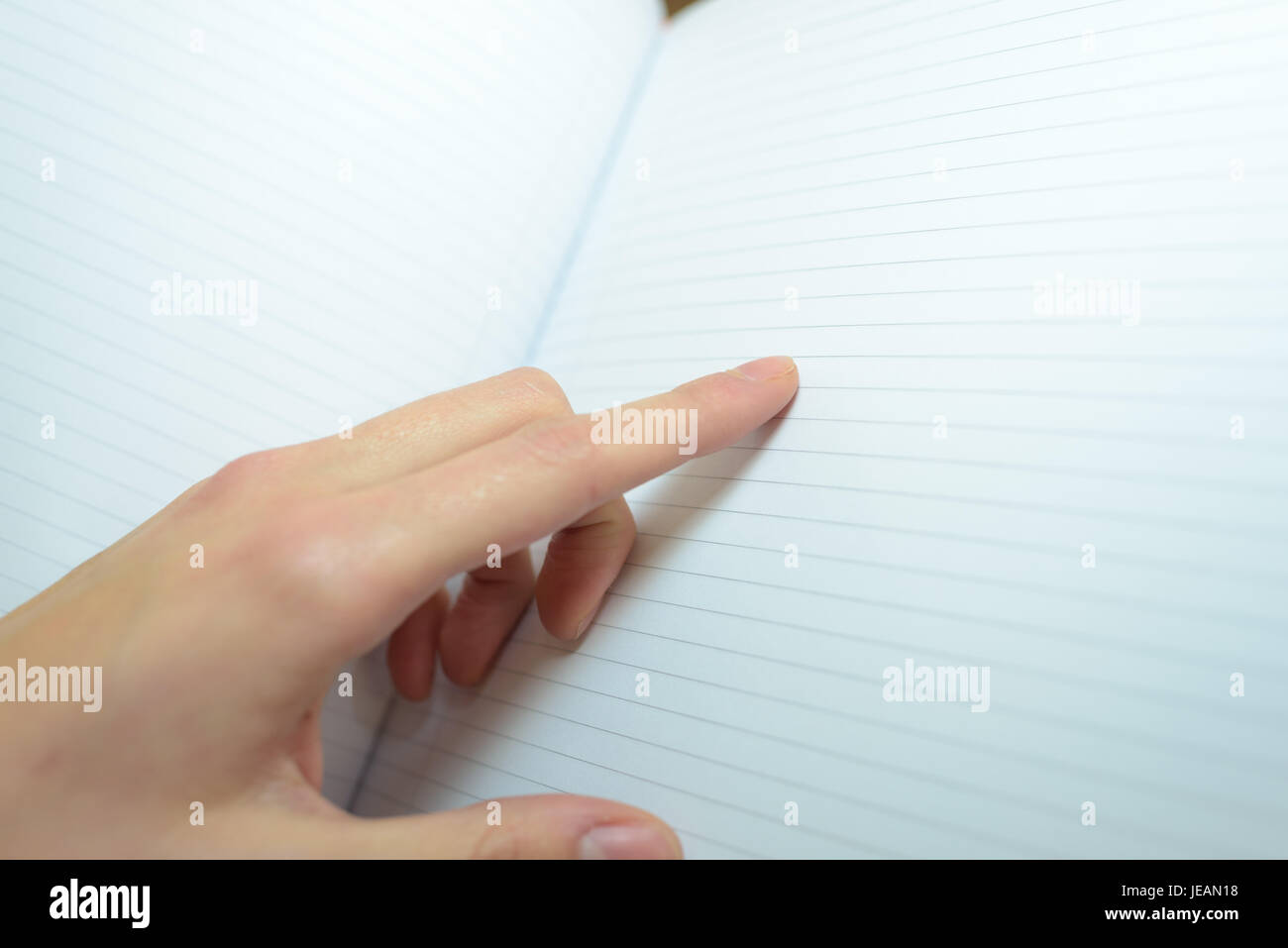 notebook are hand pointing out line Stock Photo - Alamy