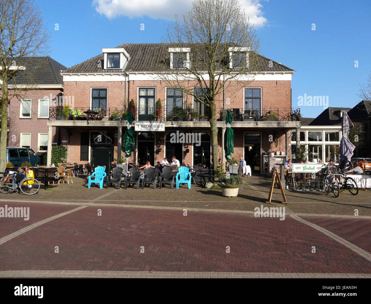 The photograph taken on April 15, 2014, captures a lively market scene ...