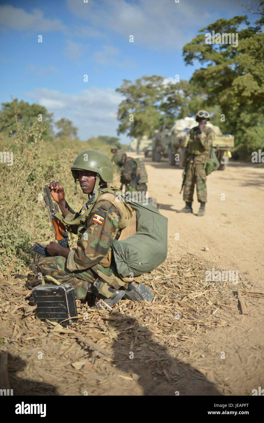A photograph showing AMISOM forces advancing during the third day of ...