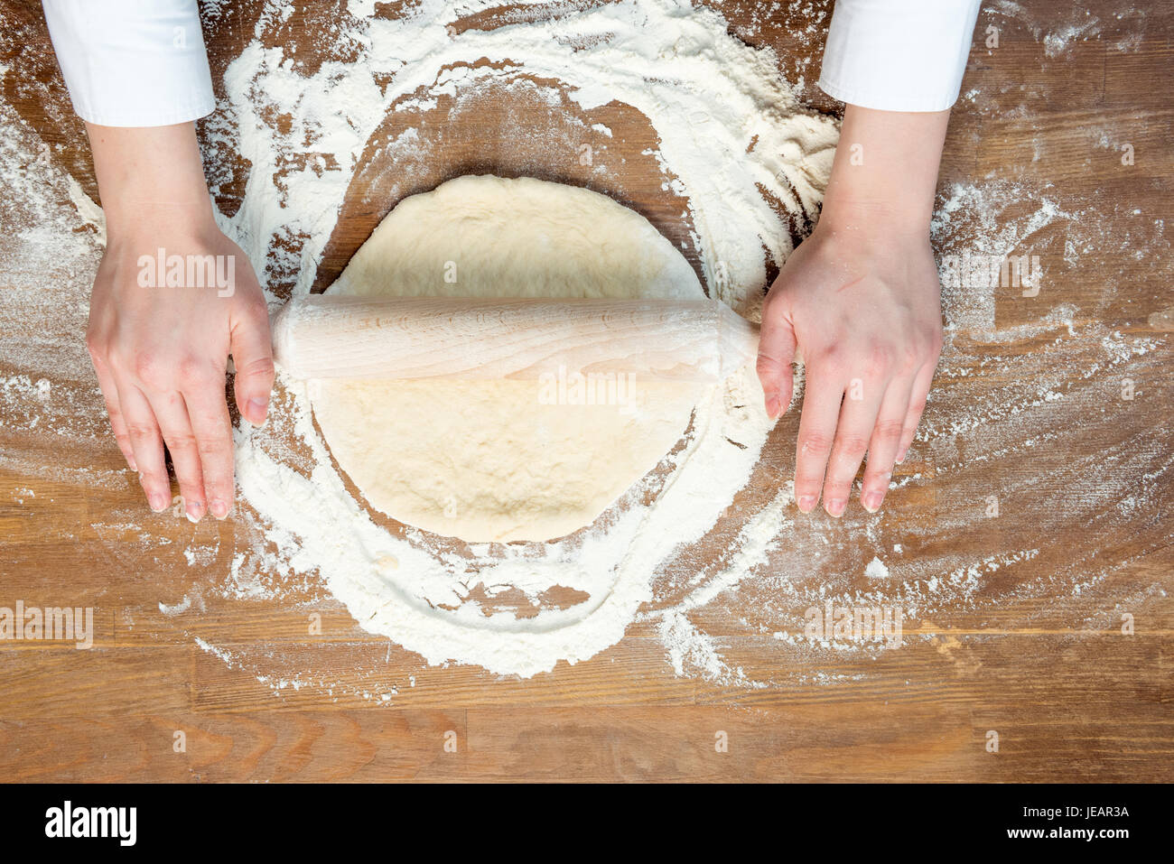 top view of child making pizza dough on wooden tabletop Stock Photo - Alamy