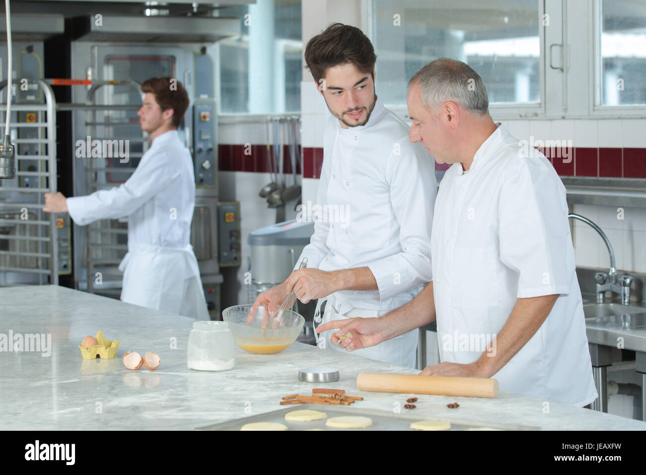 baker at the bakery making breads Stock Photo - Alamy