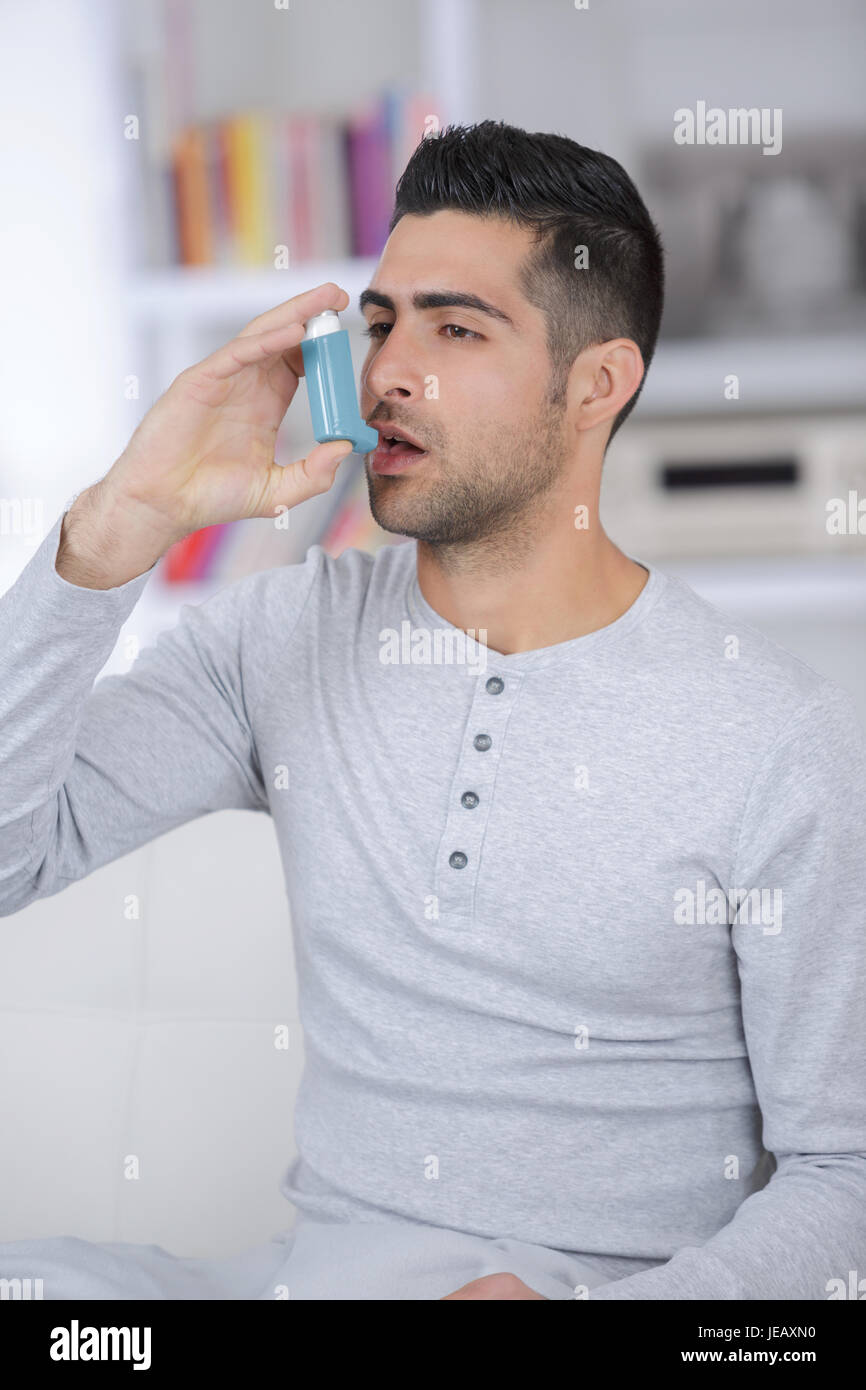 man suffering from asthma following a treatmen Stock Photo - Alamy