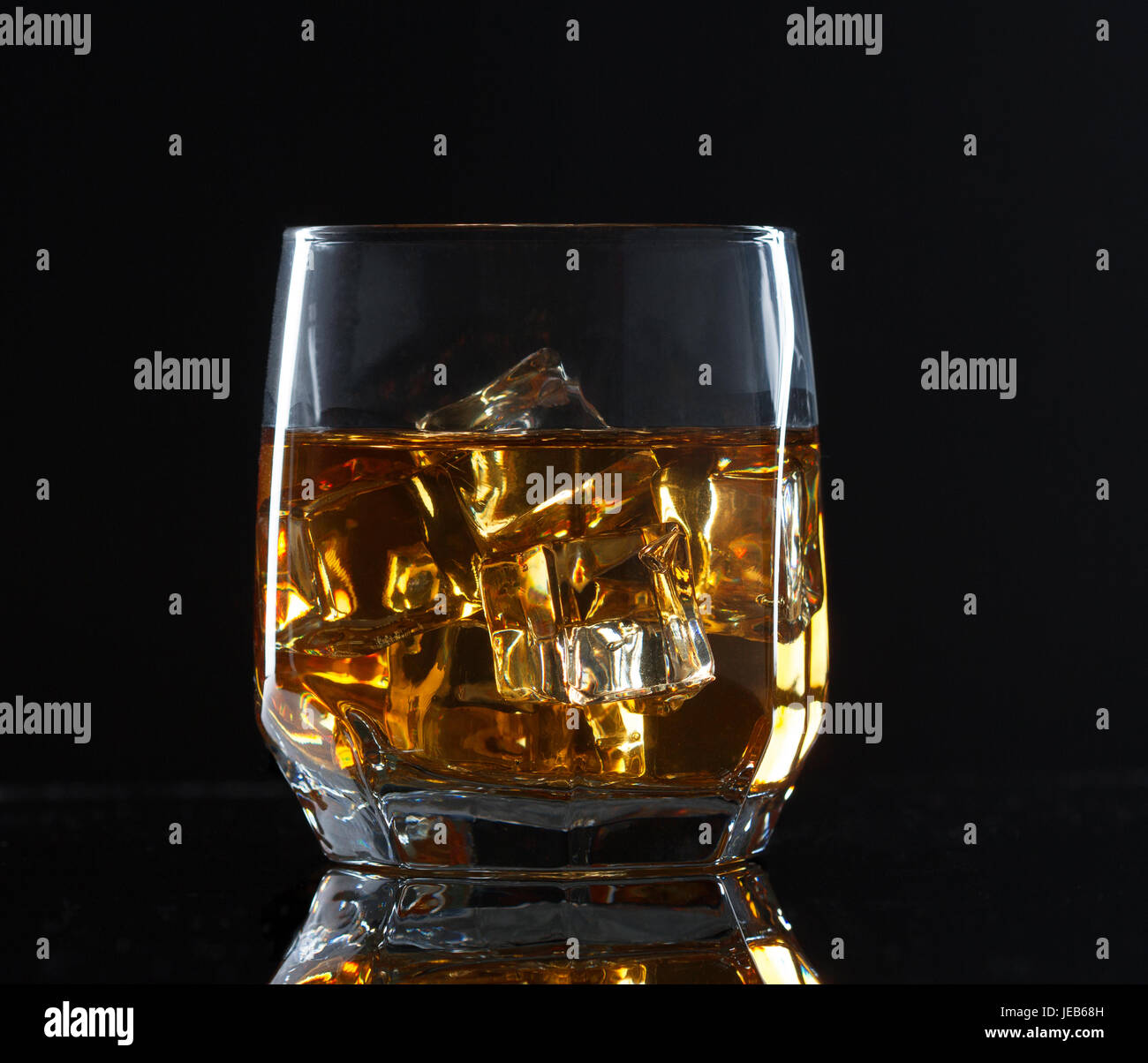 Whiskey on the rocks Stock Photo - Alamy