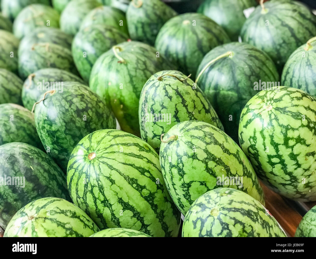 A Lot of big sweet green organic ripe watermelons In Supermarket in ...