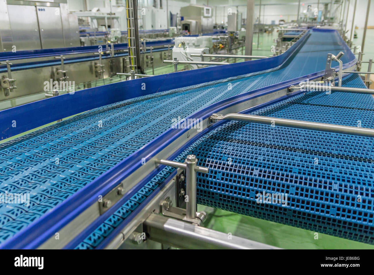 Empty conveyor belt of production line, part of industrial equipment ...