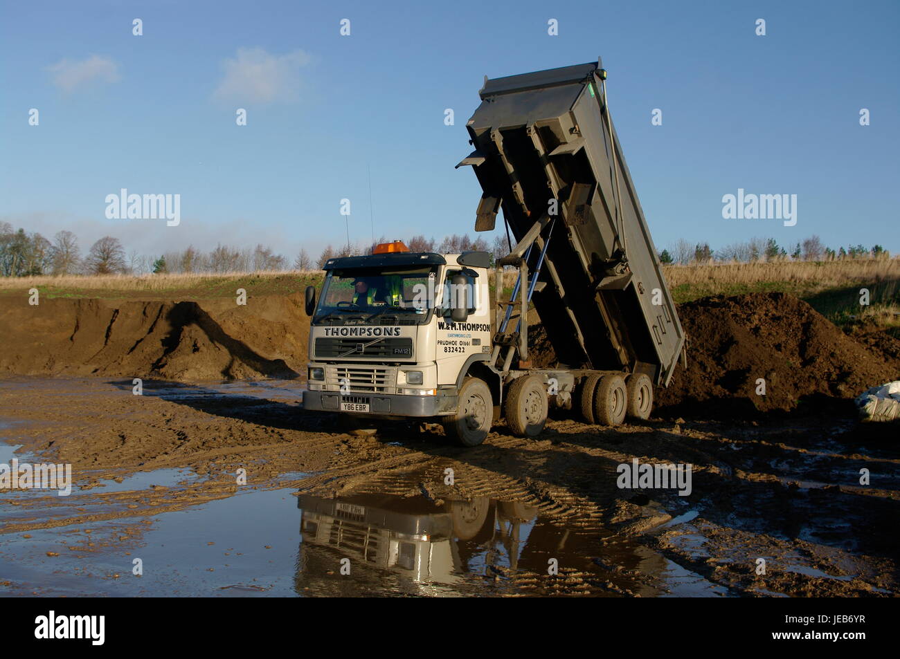 Tipper truck tipping hi-res stock photography and images - Alamy