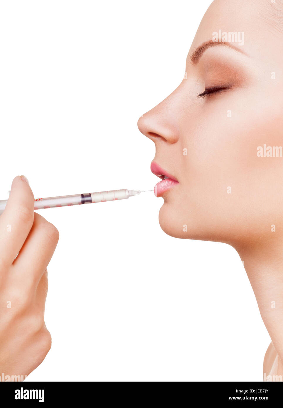 Cosmetic injection to the beautiful woman face isolated on white ...