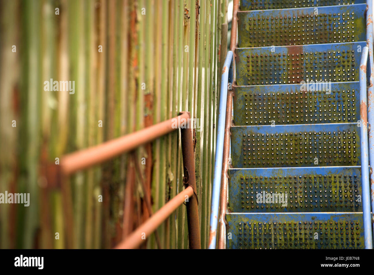 Rusty metal steps by container Stock Photo - Alamy