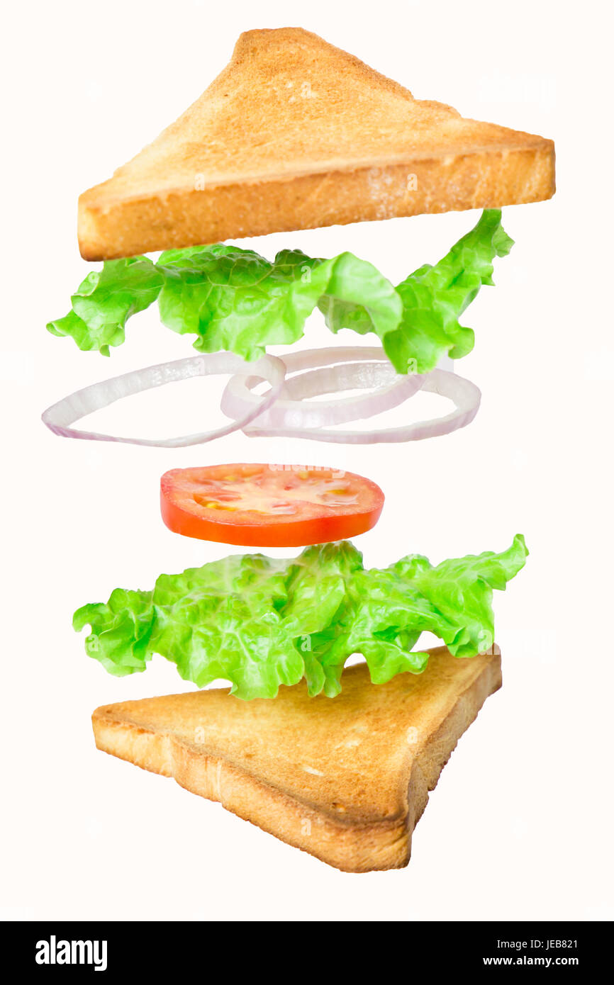 Fresh vegetarian sandwich with flying ingredients isolated on white ...