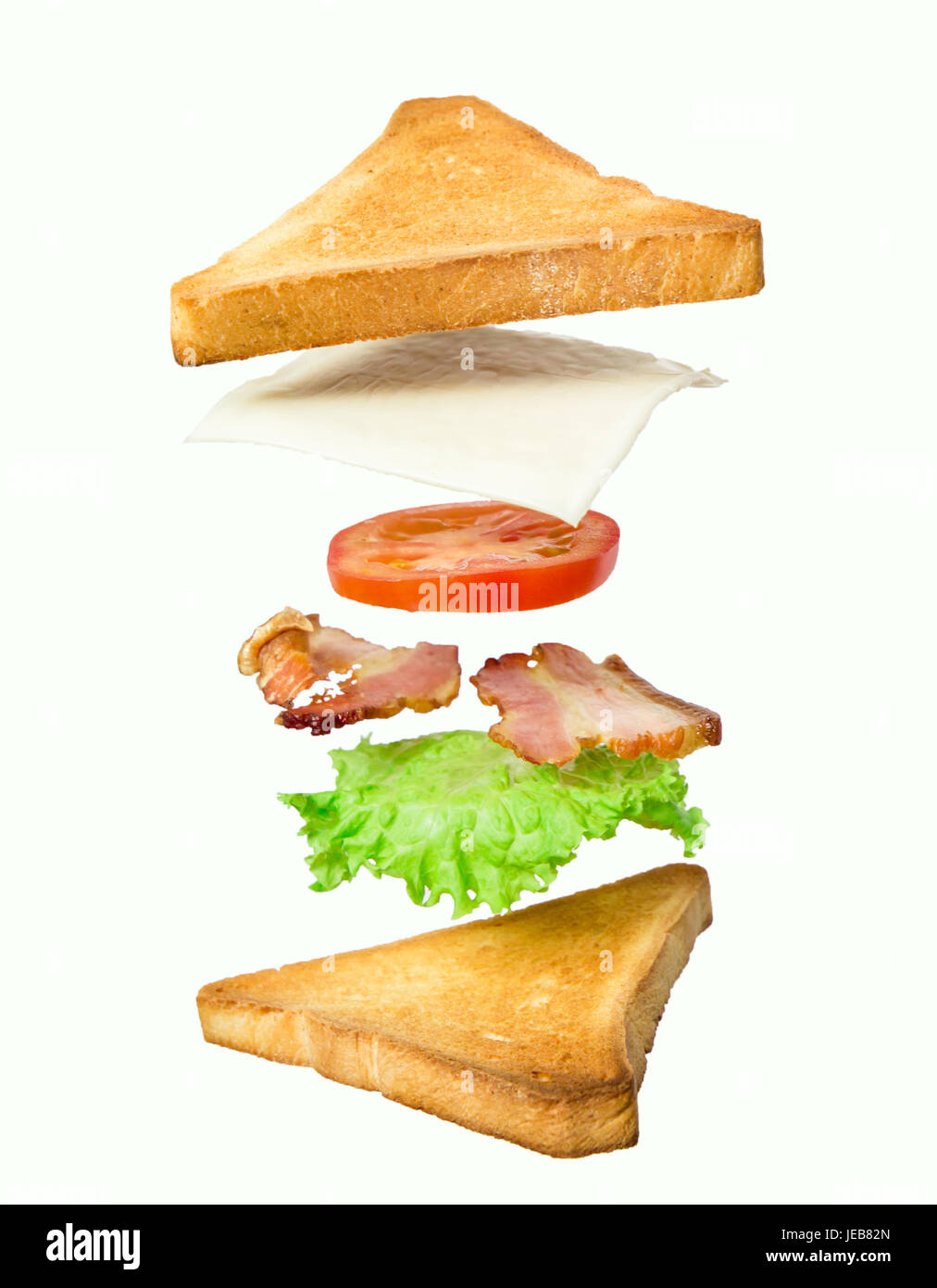 Classic burger ingredients flying on Cut Out Stock Images & Pictures ...