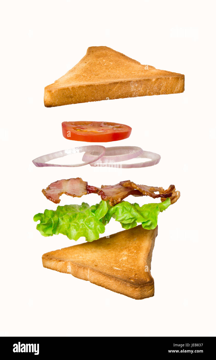 Fresh sandwich with flying ingredients isolated on white background ...