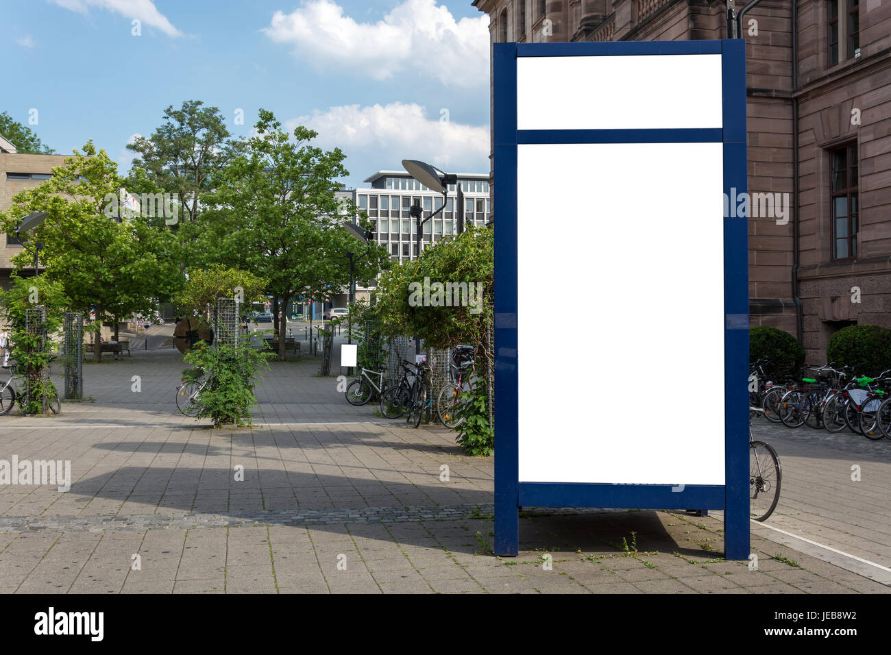 A blue blank ad space sign isolated in the street Stock Photo - Alamy