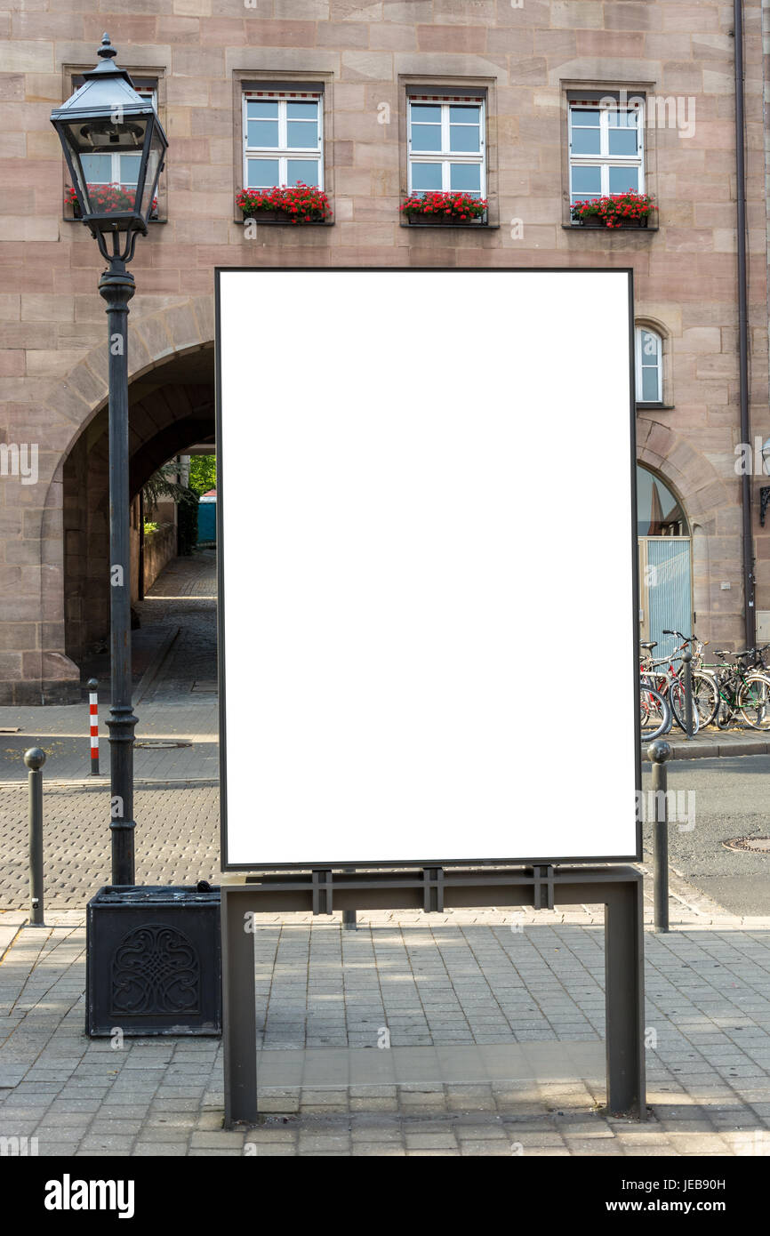 A blank ad space sign isolated in the street Stock Photo - Alamy