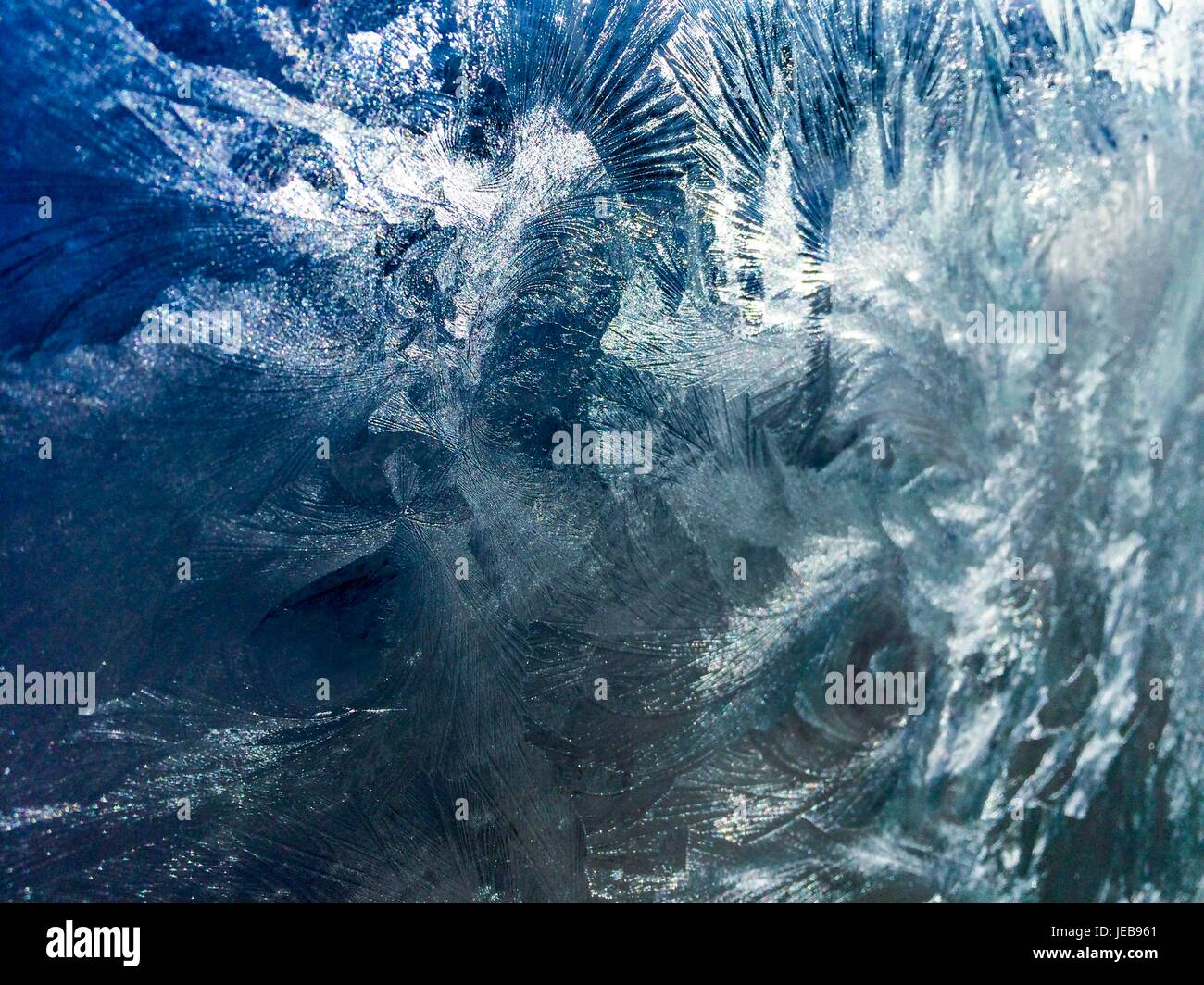 Frozen window with winter frost Stock Photo - Alamy